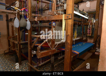 weaving of silk saree in weaving machine in Tamilnadu , India Stock ...