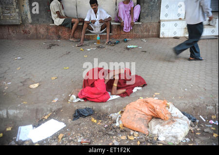 poor people sleeping on footpath pavement Bombay Mumbai Maharashtra ...