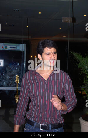 Indian television actor Hiten Tejwani pose for photos during screening ...