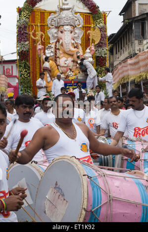 man playing musical instrument Dhol in Ganesh festival in pune at ...