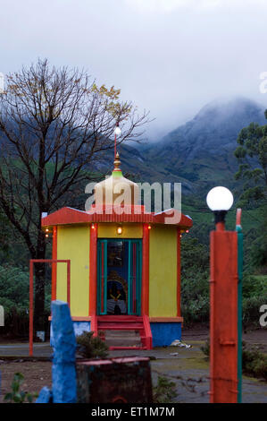 India, Kerala, Munnar, religion , colourful small Hindu temple next to ...