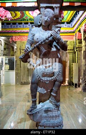 Statue of woman playing veena in sri meenakshi temple of Madurai ...