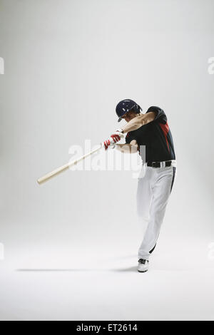 Baseball batter against white background Stock Photo - Alamy