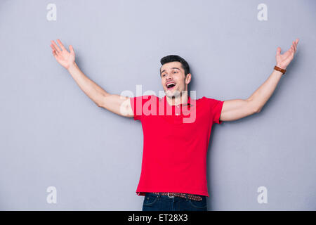 young man with arms open and welcome Stock Photo - Alamy