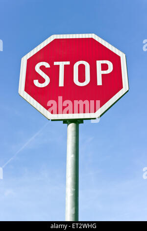 Stop sign over blue sky Stock Photo - Alamy