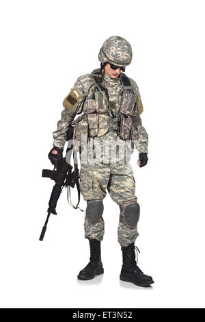 soldier holding his assault rifle isolation on white Stock Photo - Alamy
