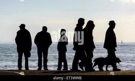 Silhouette of people walking Stock Photo - Alamy
