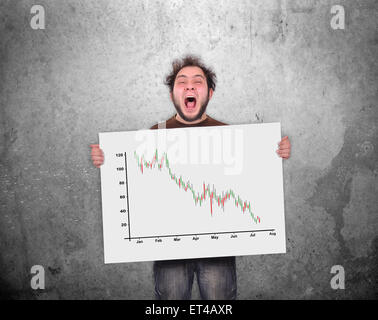 crazy businessman holding poster with chart Stock Photo - Alamy