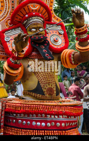 Man Dressed For Theyyam Ritual With Traditional Painting On His Face ...