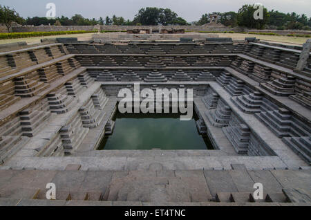 Ancient Indian step well at the ruined city of Hampi Stock Photo - Alamy