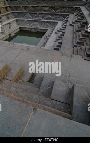 Ancient Indian step well at the ruined city of Hampi Stock Photo - Alamy
