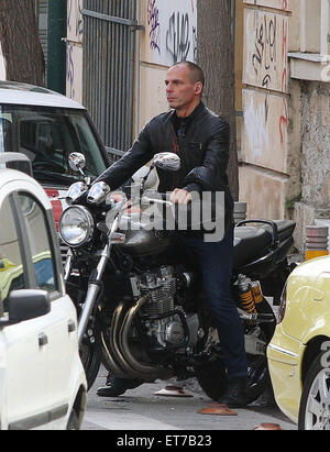 Yanis Varoufakis gets on his motorcycle parked near his home. The Stock ...