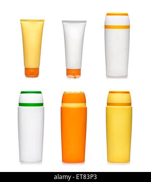 Bottles of sunscreen isolated on white background Stock Photo - Alamy