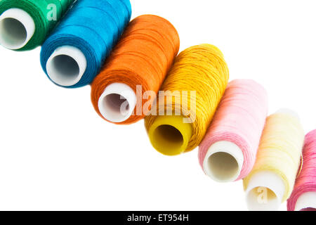 Many colorful threads over the white background Stock Photo - Alamy