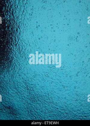 Rain drops on the ocean's surface, from underwater Stock Photo - Alamy