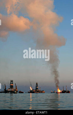 The Q4000 drilling rig burns off oil and gas at the site of the BP ...