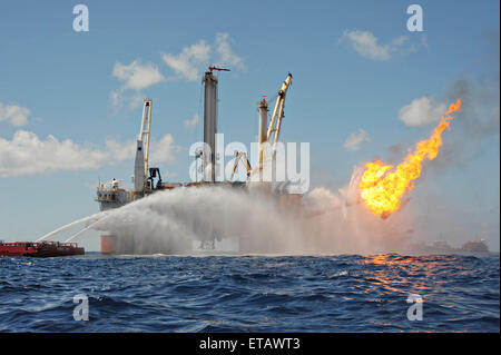 The Q4000 drilling rig burns off oil and gas at the site of the BP ...