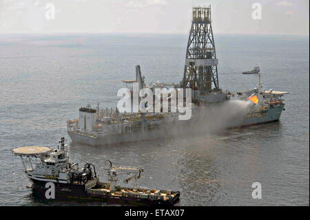 The drill ship Discover Enterprise continues to capture oil and burn ...