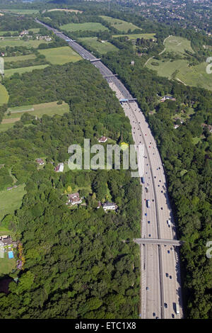 Aerial view M25 Motorway London Orbital Route high visibility workmen ...
