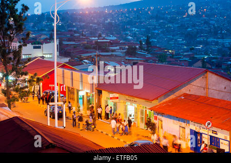 Aerial view of main street - KN 2 Avenue - at dusk, with hillside ...