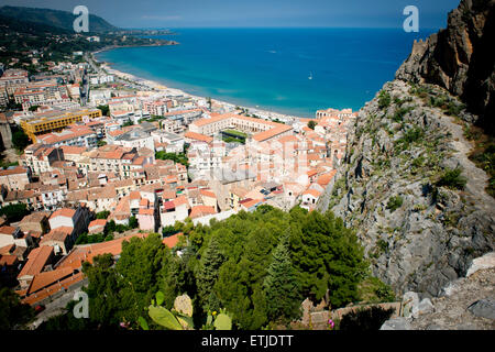 Old town of Cefalu and rock Rocca di Cefalu at dusk, Cefalu, Sicily ...