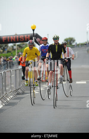 Competitors take part in the Penny Farthing Championship bike race during the Eastbourne Cycling ...
