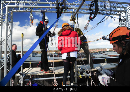 Francesca Newman-Young and Beth Sherburn abseil down Fort Dunlop for ...
