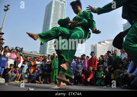 Jakarta, Indonesia. 14th June, 2015. Thousands of Pencak Silat Betawi ...