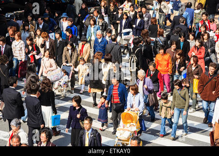 People are seen crossing the road in Sydney, Monday, June 22, 2026 ...