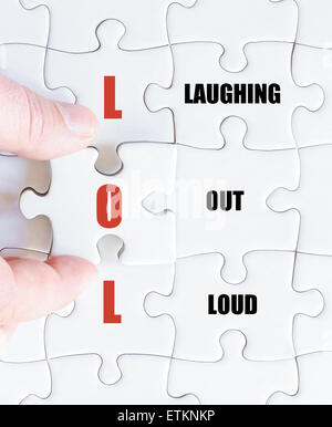 LOL acronym for Laughing Out Loud in wooden alphabet letters isolated ...