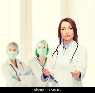 female doc prescribing pills Stock Photo - Alamy
