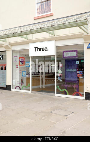 Three mobile phone shop name and logo sign above entrance on UK high ...