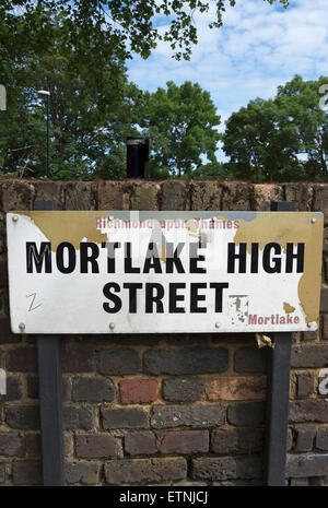 street name sign for mortlake high street, in the london borough of ...