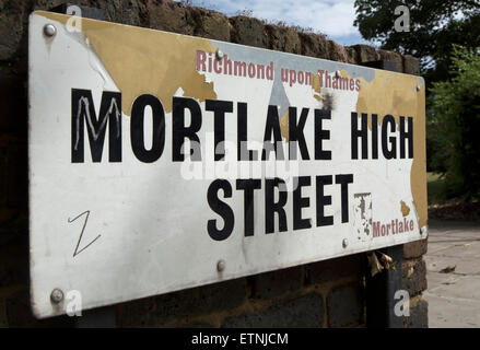 street name sign for mortlake high street, in the london borough of ...