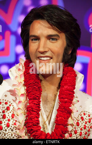 A wax figure of Elvis Presley, American singer and actor on display at ...