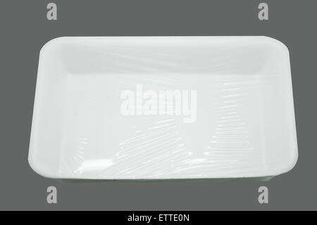 Wrapped white food tray Stock Photo - Alamy