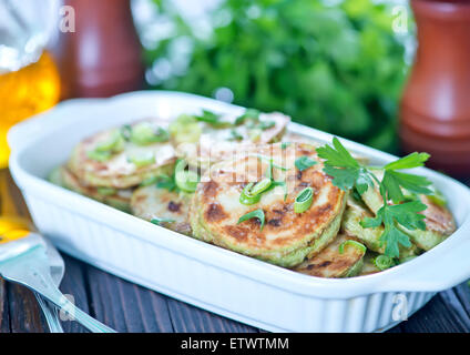 fried marrow in bowl and on a table Stock Photo - Alamy