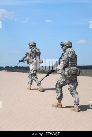 infantrymen in action Stock Photo - Alamy
