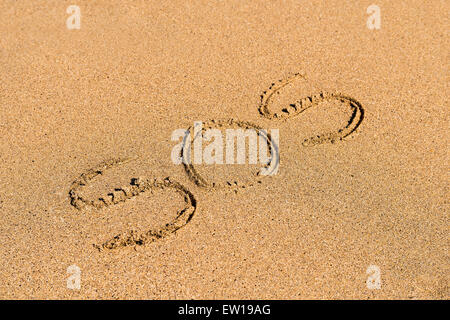 Help Sign Drawn On Beach Sand Stock Photo - Alamy