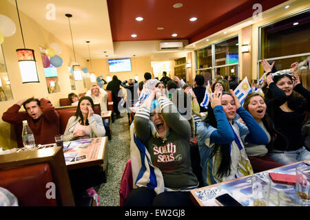Group of fans in bar with Argentina flag Stock Photo - Alamy