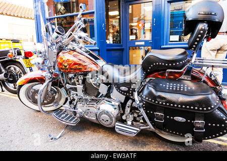 Harley Davidson Motorcycle with white wall tyres on red rims. High rise ...