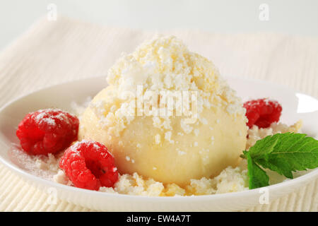 Raspberry dumpling with cottage cheese, sugar and butter Stock Photo ...