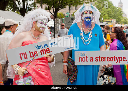 2 men dressed in drag in similar costumes at the Queens Pride Parade ...