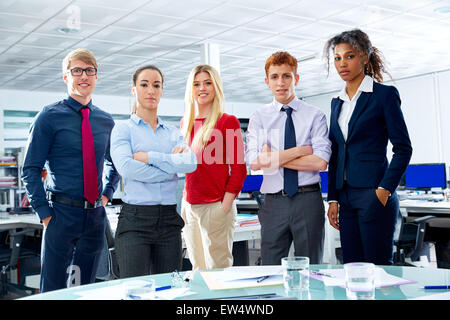 Business executive team youg people standing at office Stock Photo - Alamy
