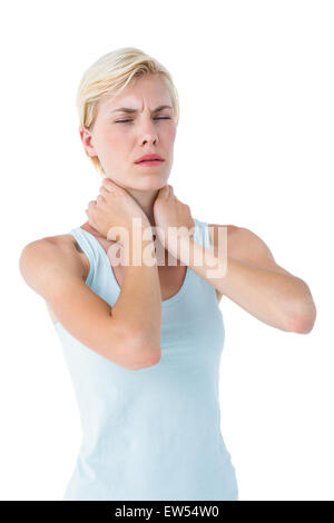 Neck pain. Woman rubbing her painful neck. She may have a muscle strain ...
