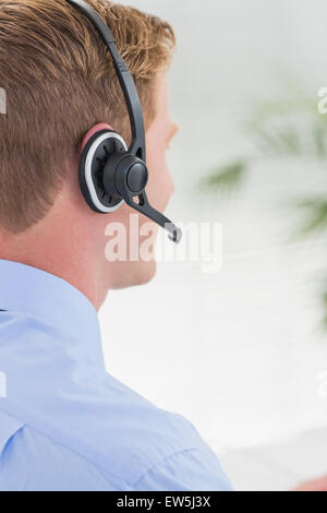 Handsome agent with headset Stock Photo - Alamy