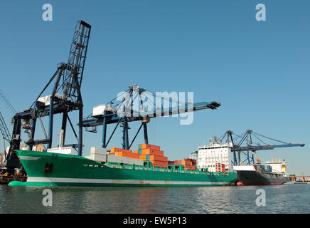 Cargo ships dock at a container terminal in Lianyungang Port ...