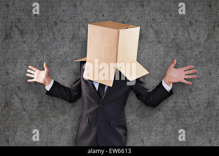 Composite image of anonymous businessman with hands out Stock Photo - Alamy