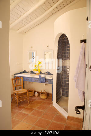 Shower in white bathroom in Spanish home Stock Photo - Alamy