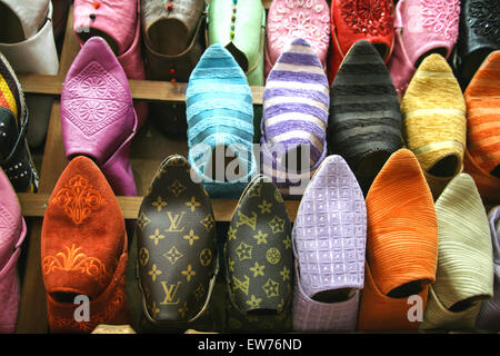 Fake,Counterfeit goods.Colourful slippers/ shoes/ local style leather ...